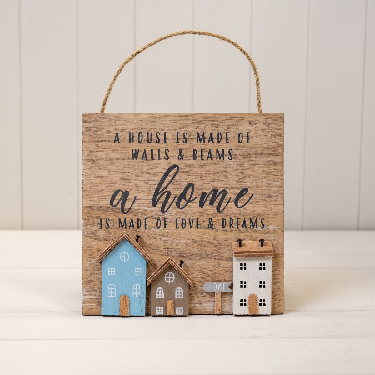 Wooden Home Sign with Quote 'A House is Made of Walls & Beams. A Home ...