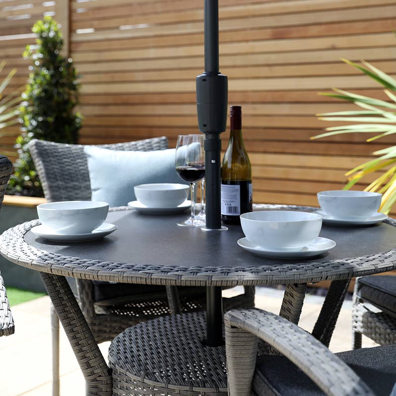 Supremo Iris 4 Seat Outdoor Dining Set with Round Table, Parasol & Bas – Southwood Garden Centre
